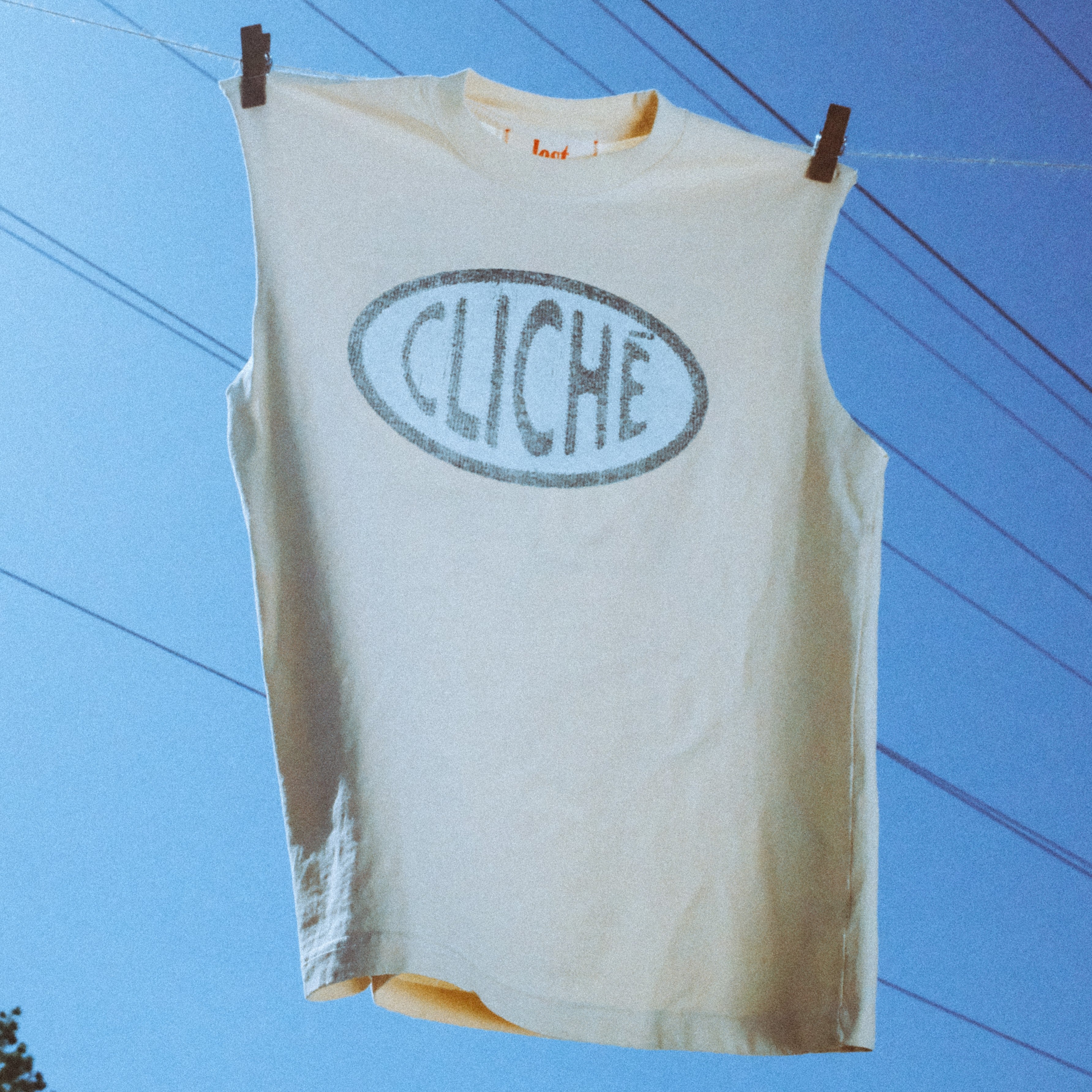 cliché cream cut off tank - mgk
